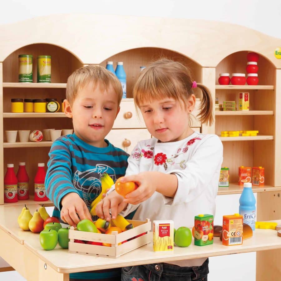 Pretend play with Erzi realistic wooden play food - Teia Education & Play