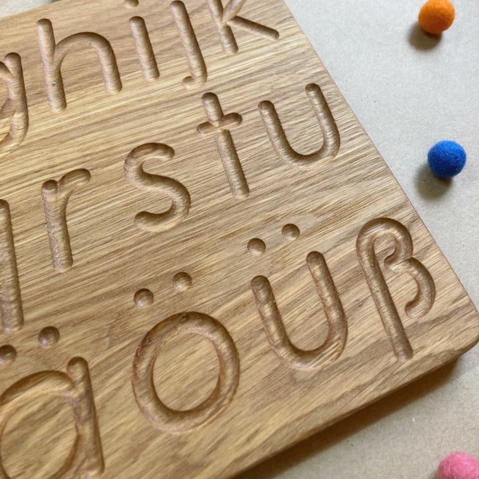 Reversible wooden alphabet tracing board: German - Threewood